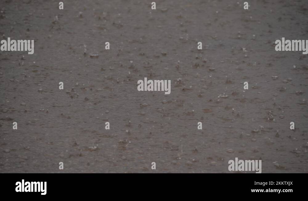 Drops falling in puddle Stock Videos & Footage - HD and 4K Video Clips ...