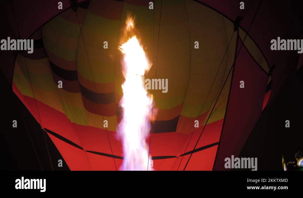 Fire from gas jet burner in hot air balloon flame rising at night Stock ...