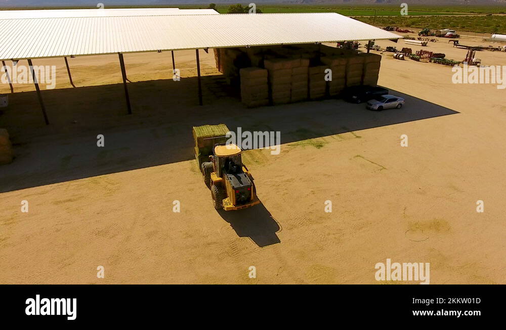 Farm equipment loading hay Stock Videos & Footage - HD and 4K Video ...