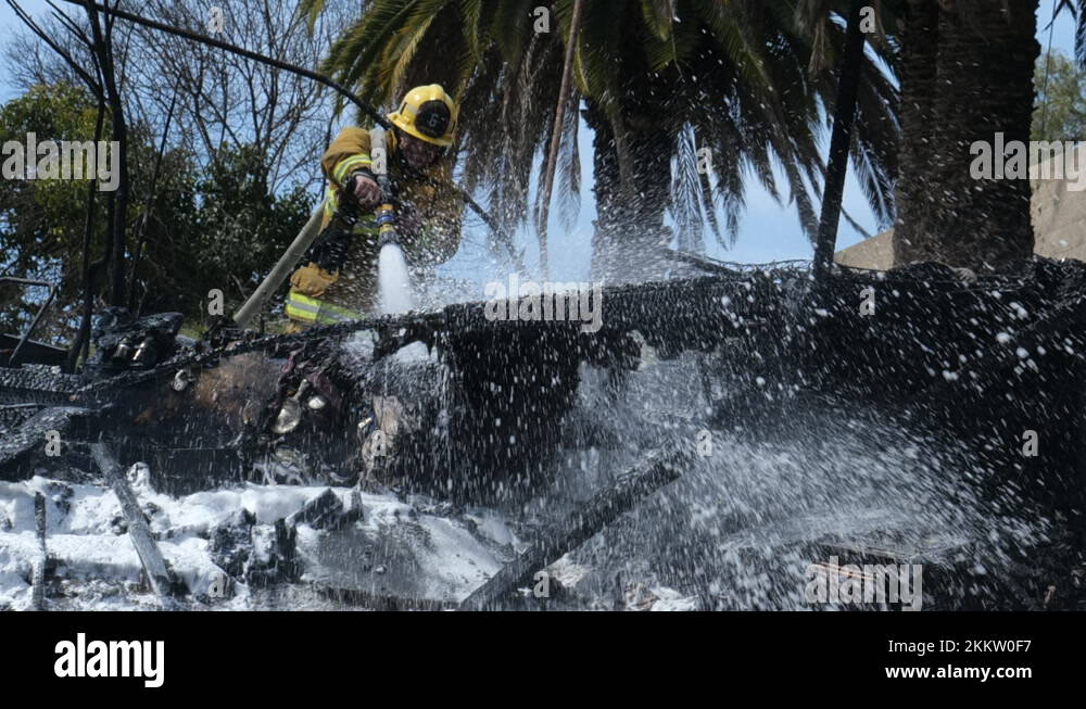 Puts out a fire Stock Videos & Footage - HD and 4K Video Clips - Alamy