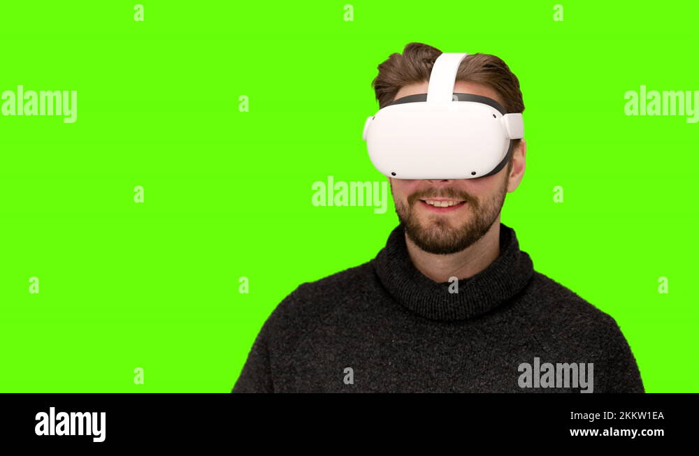 Close up of man in latest modern white oculus quest 2 vr ar headset ...