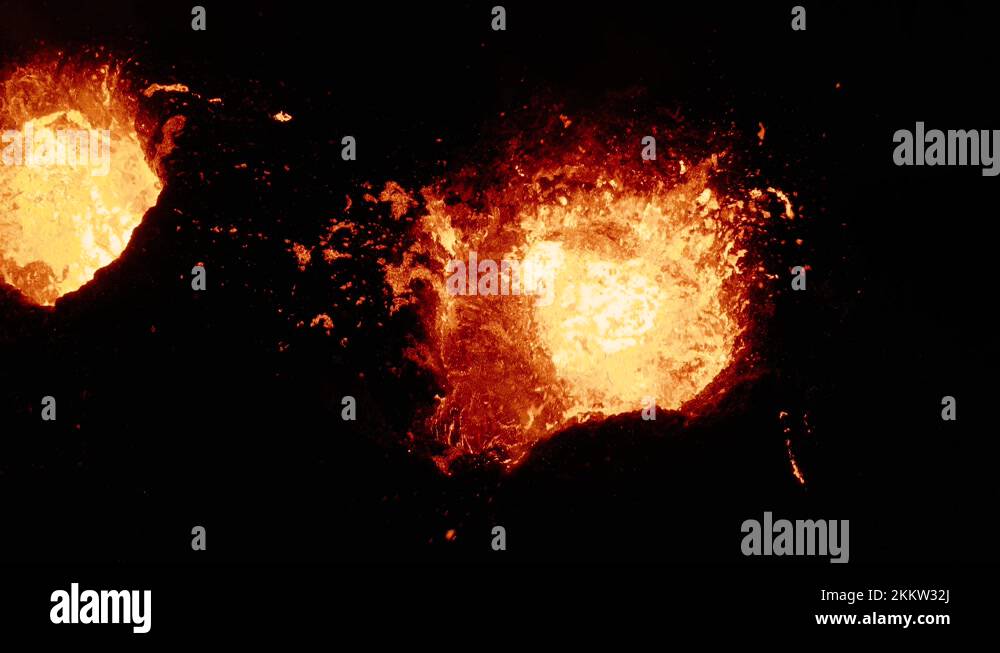 Molten magma exploding from crater at Fagradalsfjall volcano, top down ...