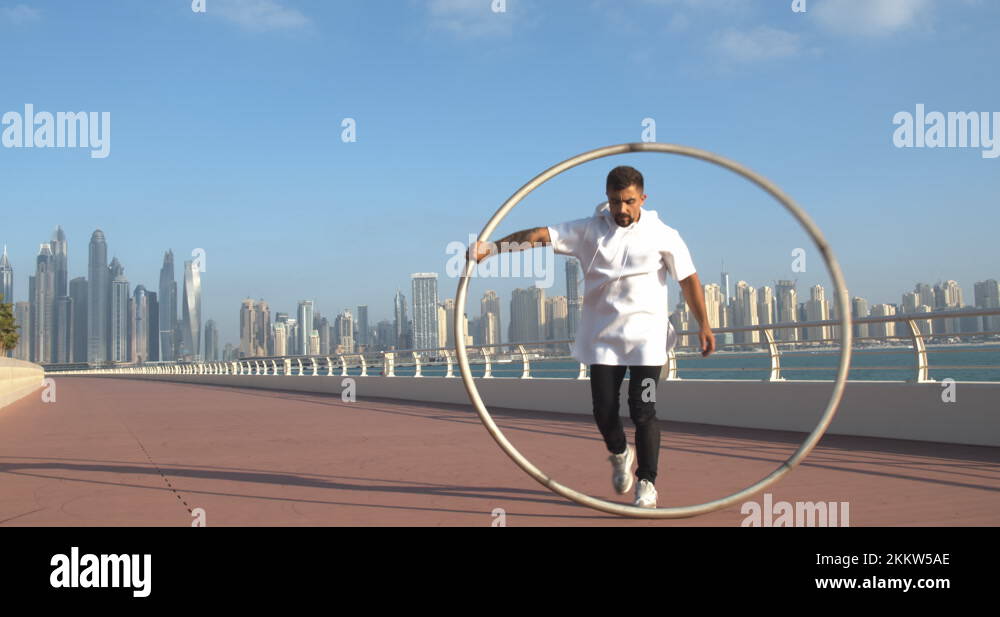 The Palm Jumeirah view on Dubai Marina, wheel gymnast performance, 4k ...