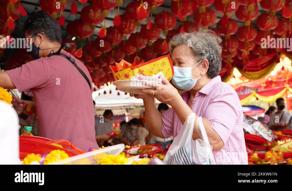 Asian People Praying and Doing Worship Ceremony In Chinese Temple Stock ...