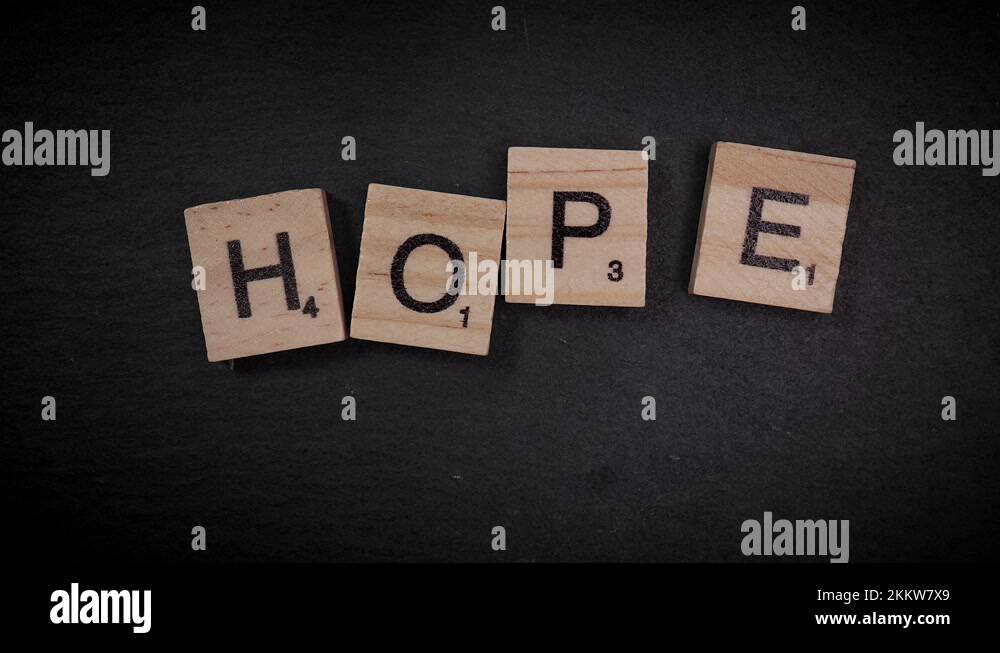 Writing the word Hope with wooden letters Stock Video Footage - Alamy