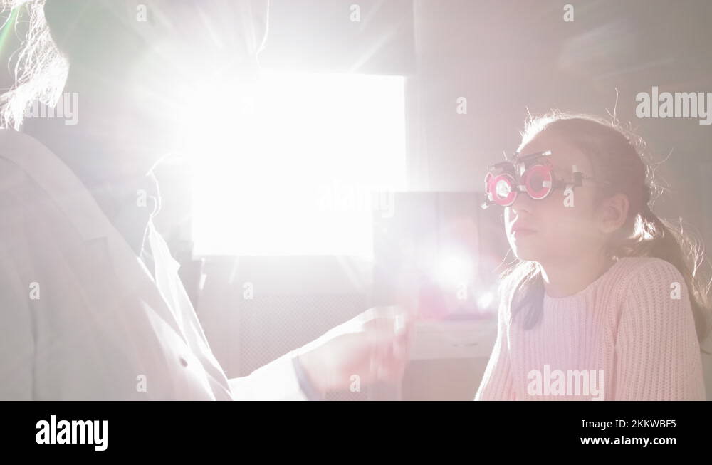 Little Girl In Trial Frame Testing Eye Vision Stock Video Footage - Alamy