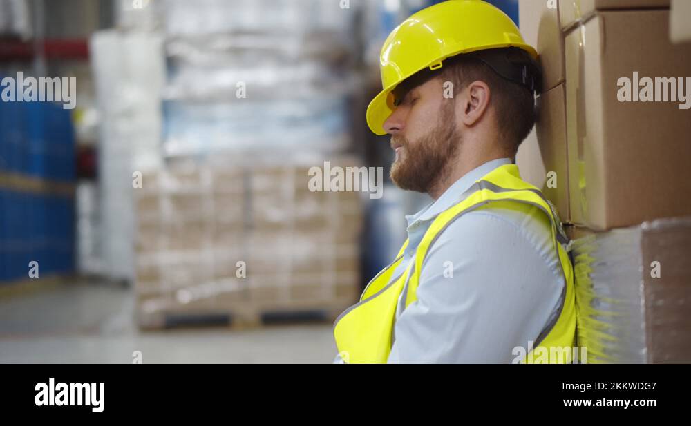 Worker leaning in warehouse Stock Videos & Footage - HD and 4K Video ...