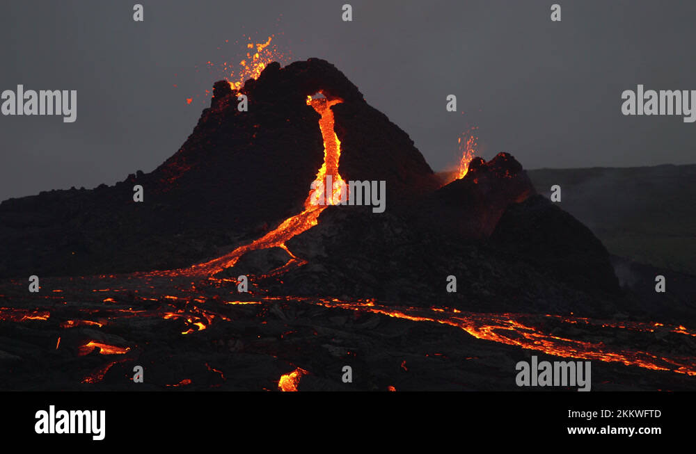 Volcanic eruption Iceland 2021 lava cone river Stock Video Footage - Alamy