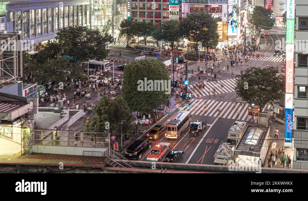 Passing Train At JR Shibuya Station With Iconic Intersection Of Shibuya ...