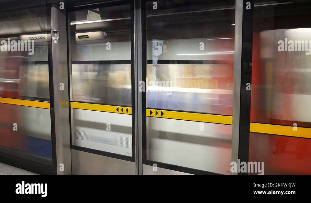 London. Arrival and departure of the train in the subway Stock Video ...