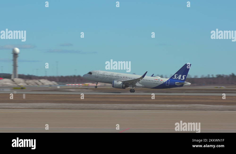 airplane sas airbus a320 neo taking off slow motion panning left Stock ...