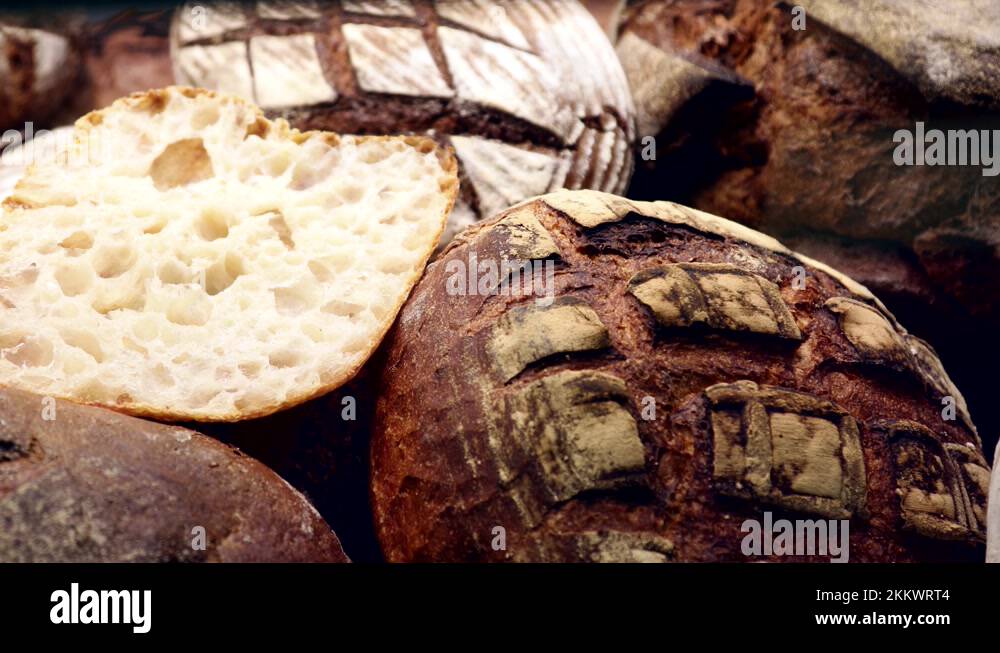many different types of bread. Wholegrain, round, rolls and loaves ...