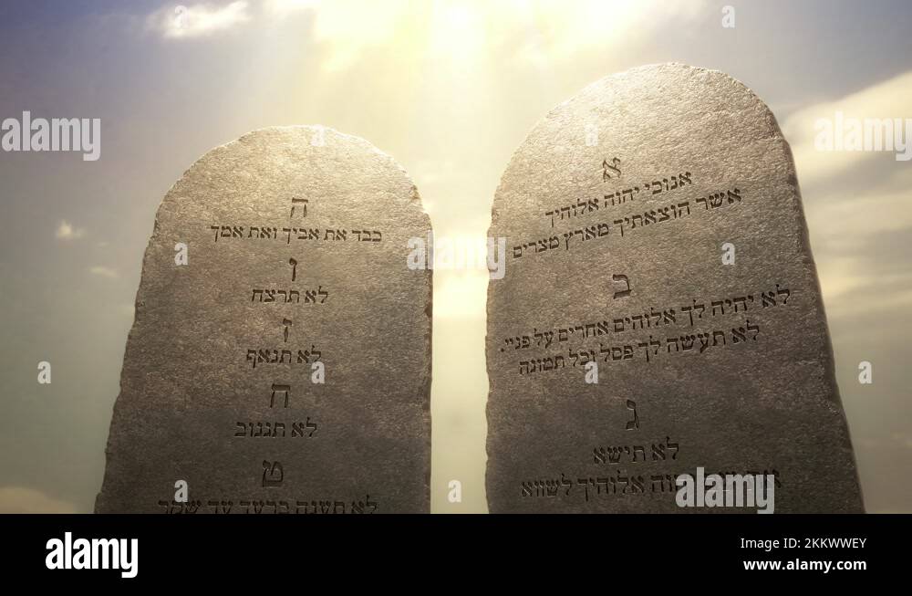 Golden letters of the Ten Commandments on the stone tablets, God's laws ...