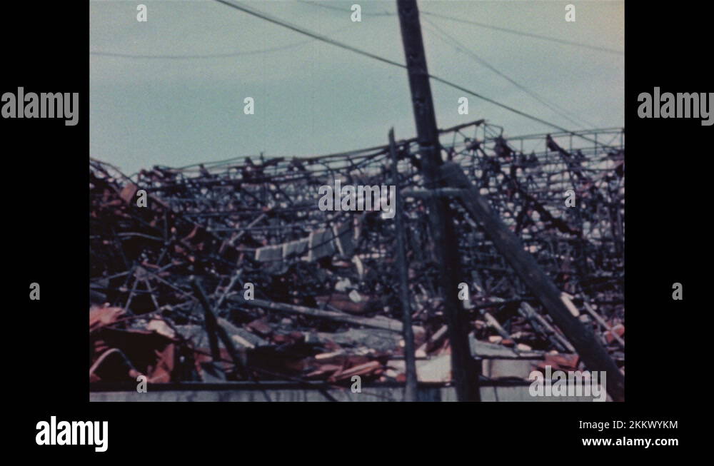1940s Nagasaki: Destroyed building, collapsed steel frame, downed power ...