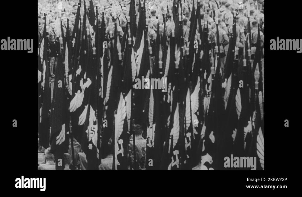 1930s: Intertitle card. German soldiers, officers in military parade ...