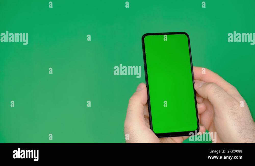 Handheld Camera: Point of View man Holding Chroma Key Green Screen ...