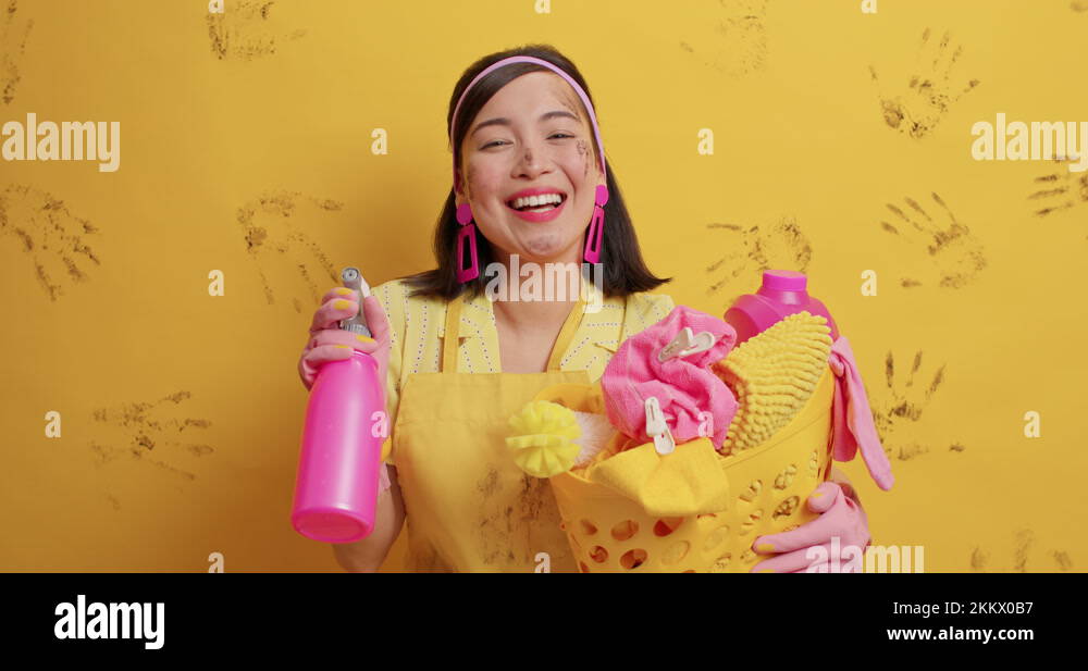 Domestic chores and housekeeping concept. Positive beautiful housewife ...