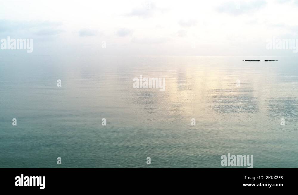 Beach top view or aerial view showing white wave foam hit the sand ...