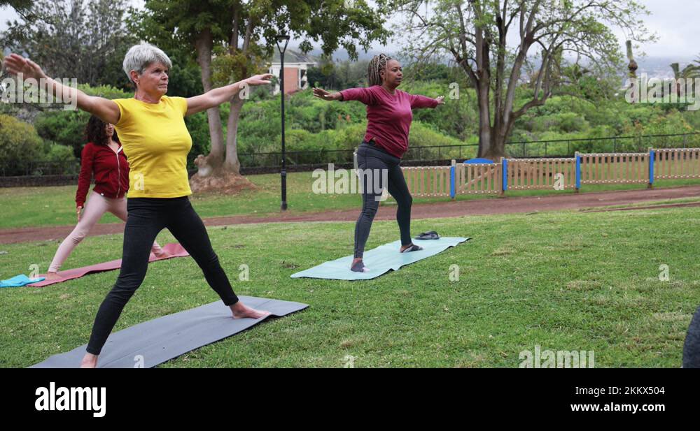 Multi generational people doing yoga Stock Videos & Footage - HD and 4K ...