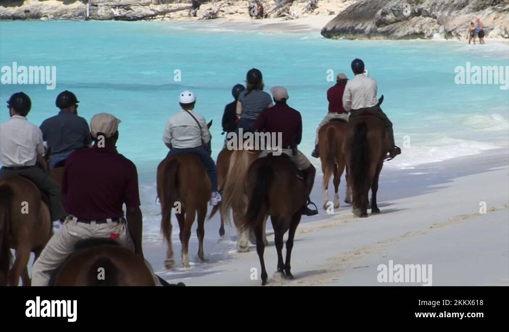 Horse ride on the beach in Half Moon Cay, Bahamas Stock Video Footage ...