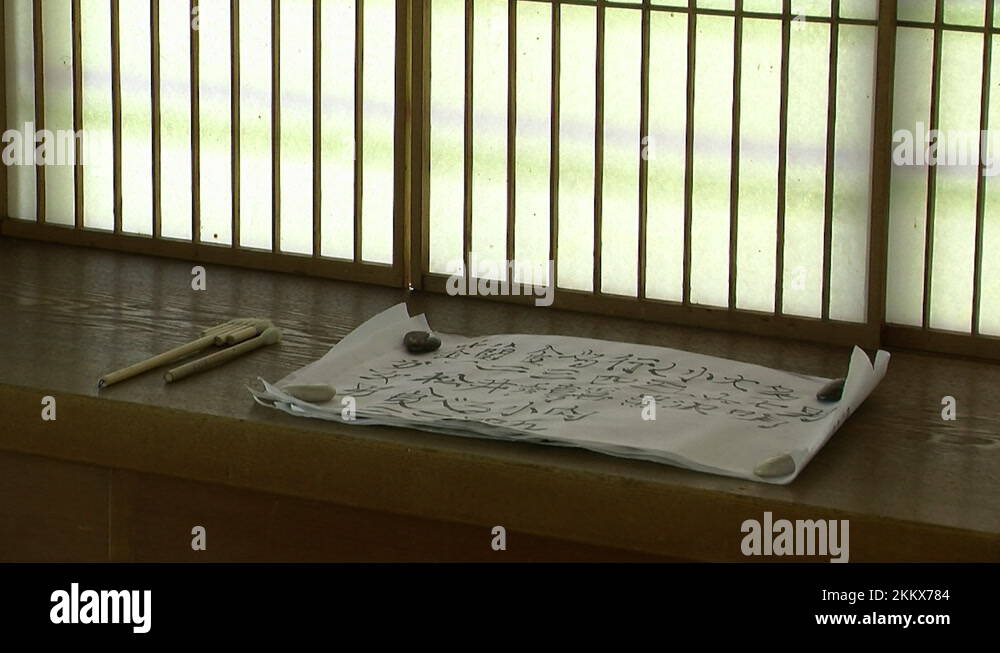 Scroll of calligraphy sits on a shoin desk in a Japanese house Stock ...