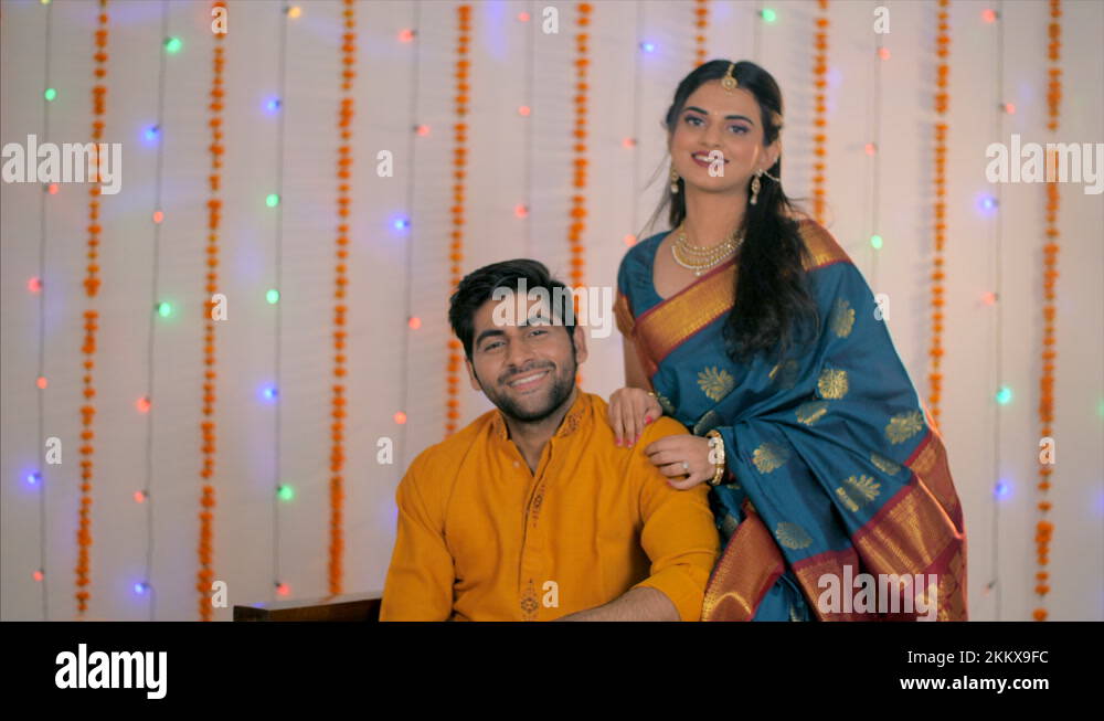 Handsome Indian husband happy to see his wife in traditional saree on ...