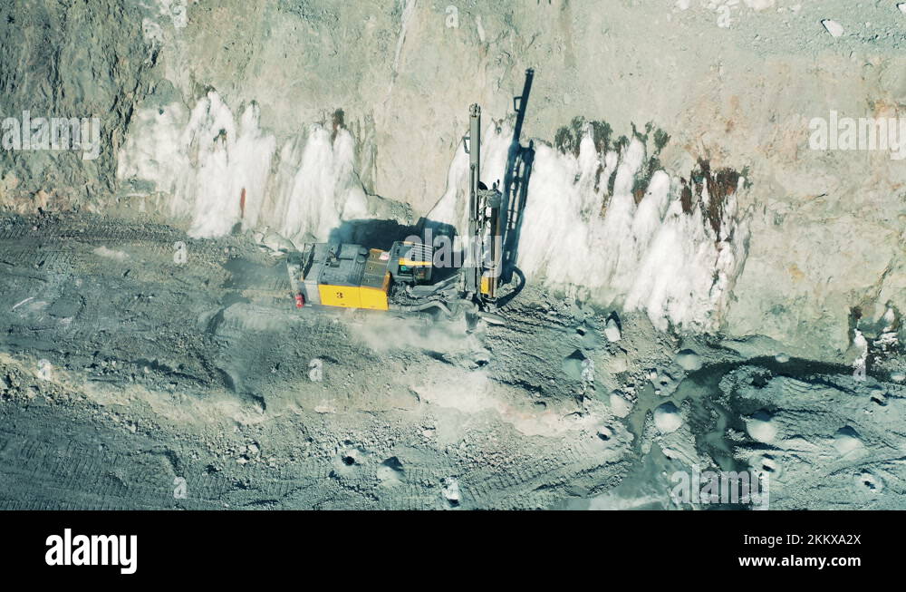 Mining industry concept. Open pit with a boring machine at work Stock ...