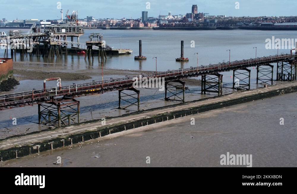 Crude oil tanker ship loading at refinery pipeline harbour terminal ...