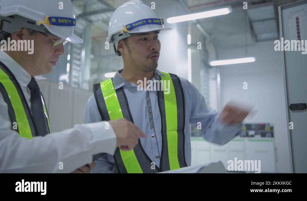 Engineer concept of 4k Resolution. The employee is checking the ...