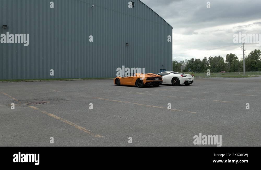 Ferrari parked Stock Videos & Footage - HD and 4K Video Clips - Alamy