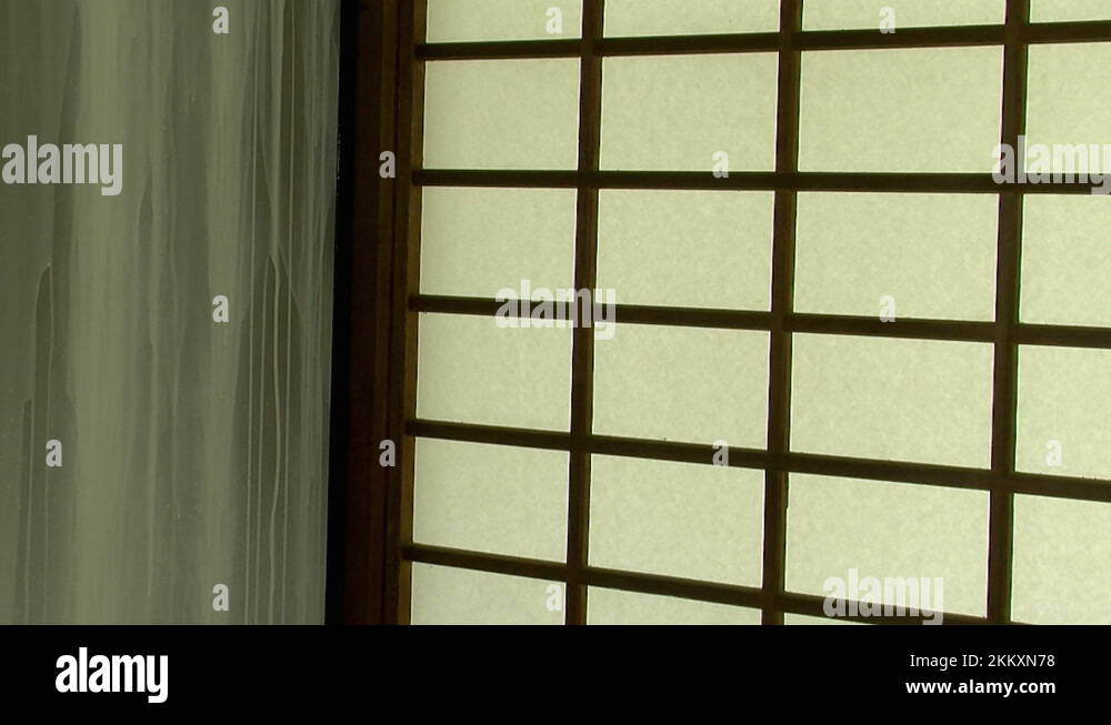 Slow zoom-out of Japanese shoji panel and adjacent fusuma panel Stock ...