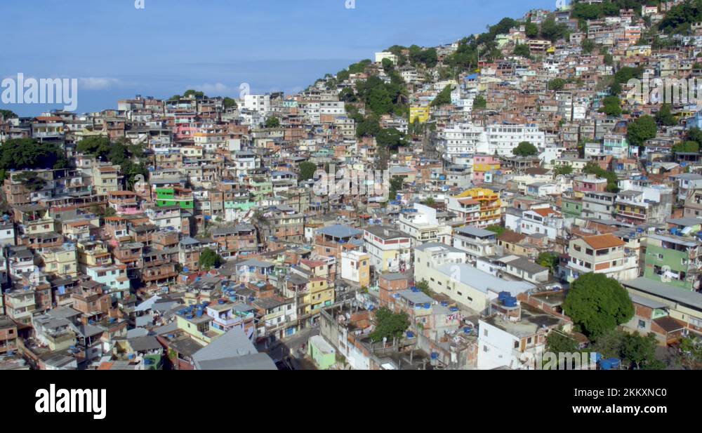 Slow panorama aerail view of Vidigal, a dangerous favela community in ...