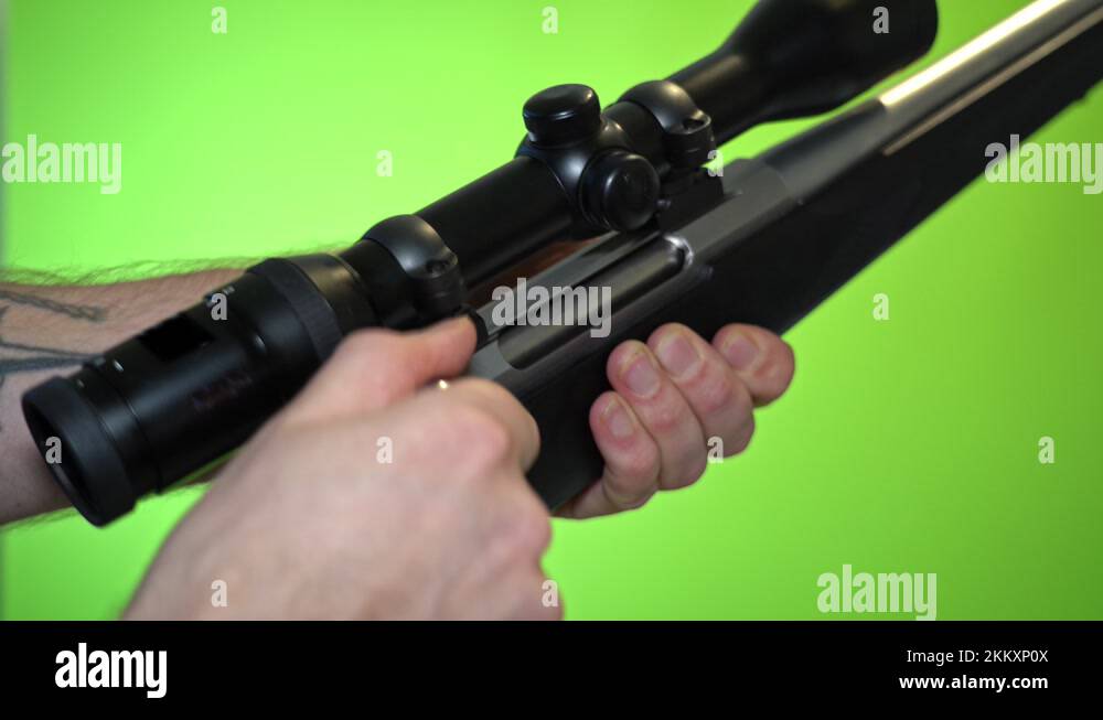 Reloading rifle by pulling back endpiece and putting new cartridge into ...