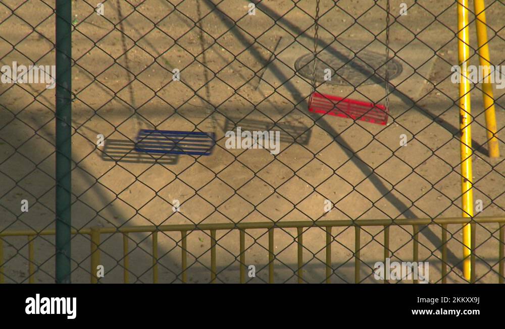 Swings for children to play in a playground built in a favela slum of ...