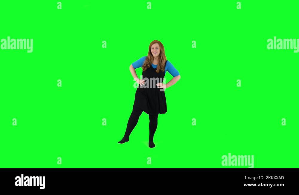Teacher stretches toe-tapping in front of the green screen Stock Video ...