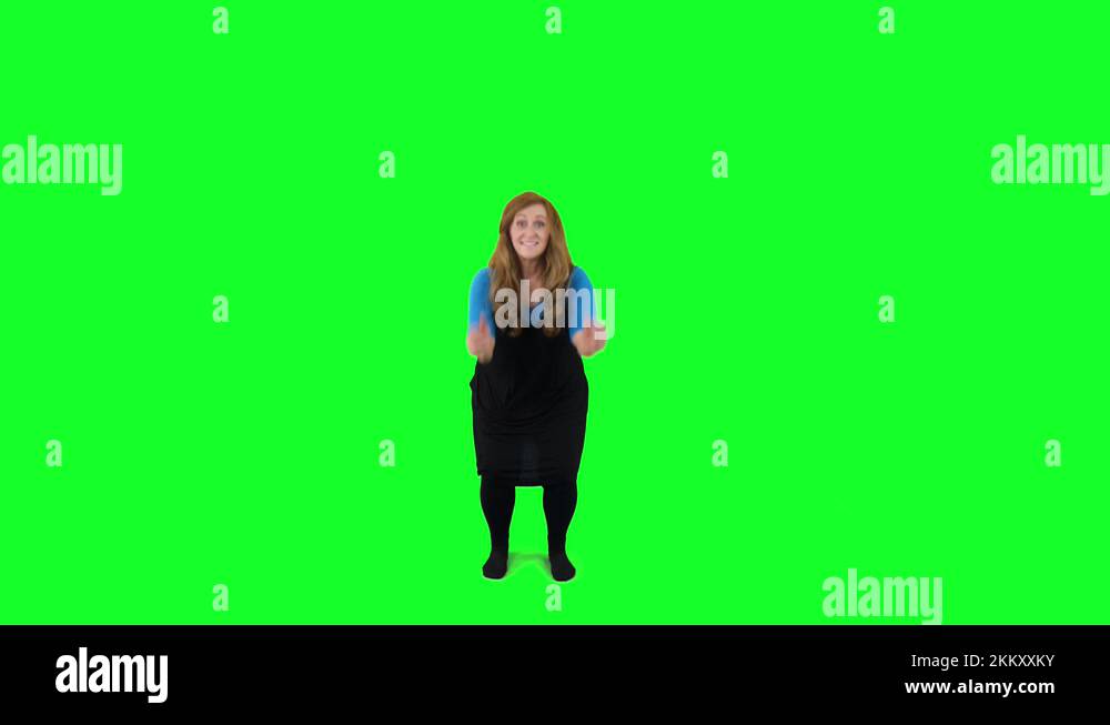 Teacher jumping in front of the green screen Stock Video Footage - Alamy