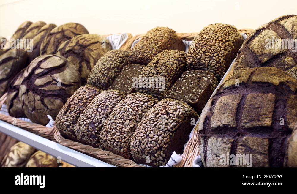 many different types of bread. Wholegrain, round, rolls and loaves ...