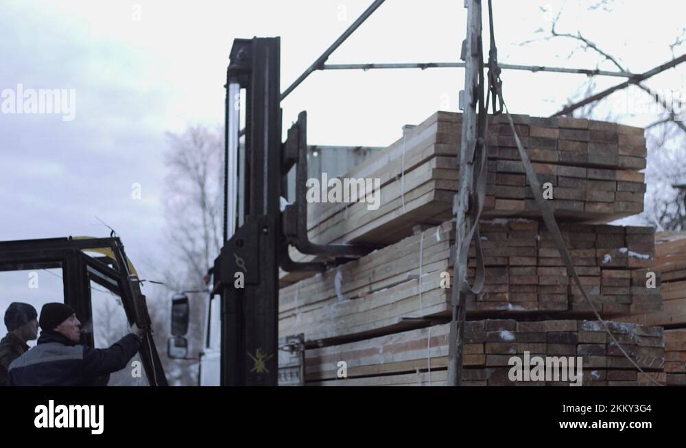 Forklift Load Stack Of Lumber Planks On Lorry Truck At Sawmill Factory Stock Video Footage Alamy 