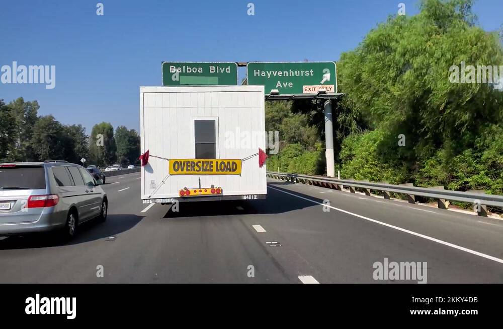 Oversize Load manufactured home on freeway being transported slow and ...