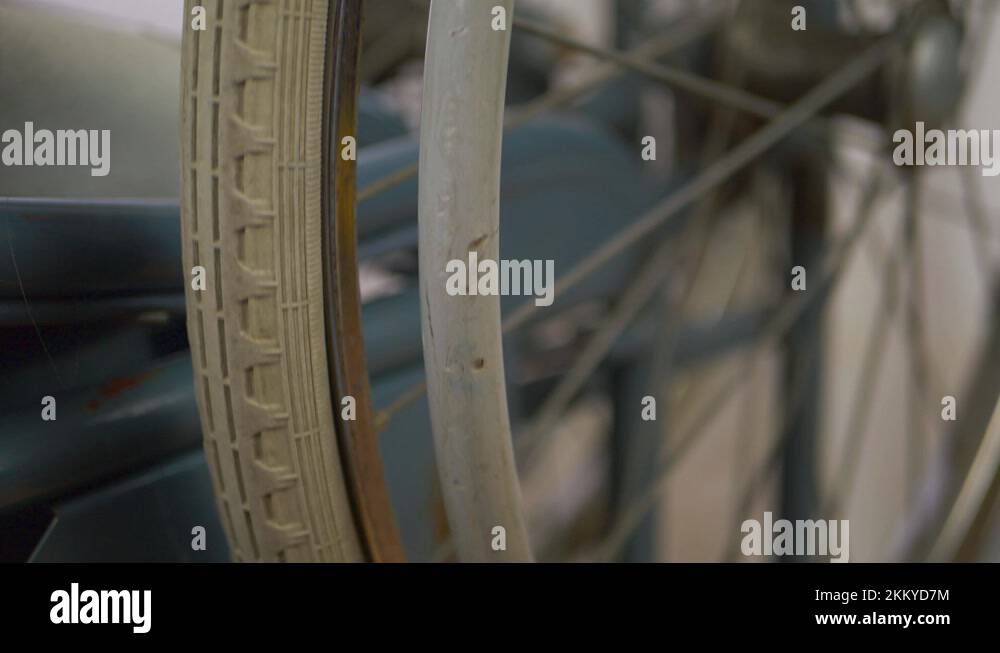 Wheelchair wheel spinning slowly side view Stock Video Footage - Alamy