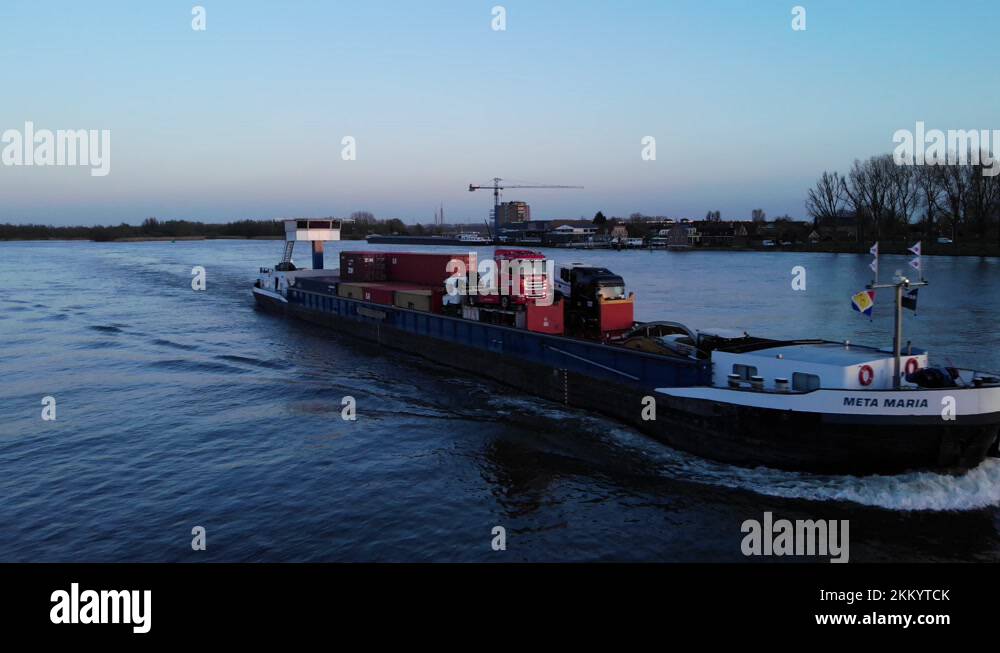 Intermodal Containers And Trucks Loaded In A Cargo Ship Of Meta Maria ...