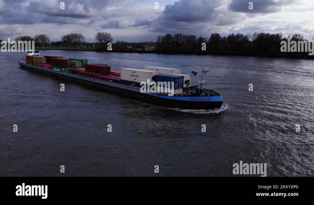 Barge With Intermodal Containers Cruising At Oude Maas River Under Stock Video Footage - Alamy