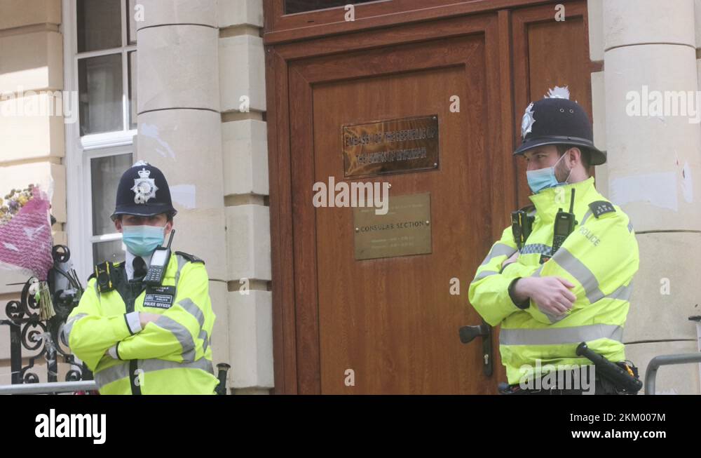 Police officers outside entrance Stock Videos & Footage - HD and 4K ...