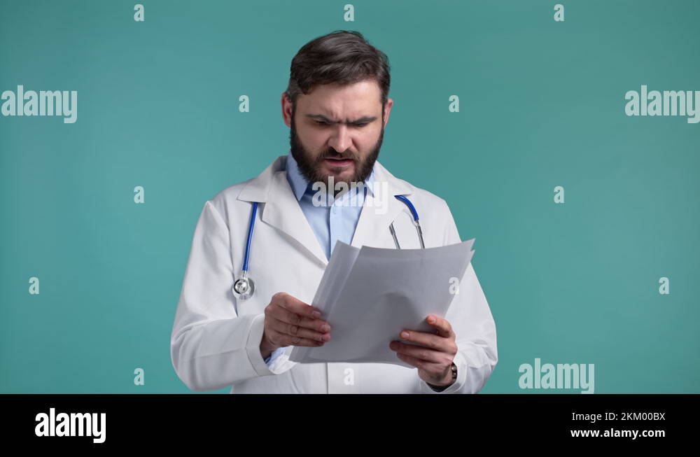 Angry doctor throws away papers. Furious male doc man throwing crumpled ...
