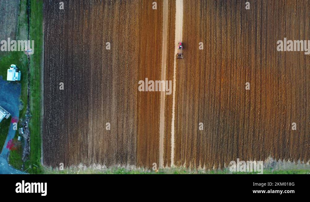 Agriculture tractor plowing field Stock Videos & Footage - HD and 4K ...