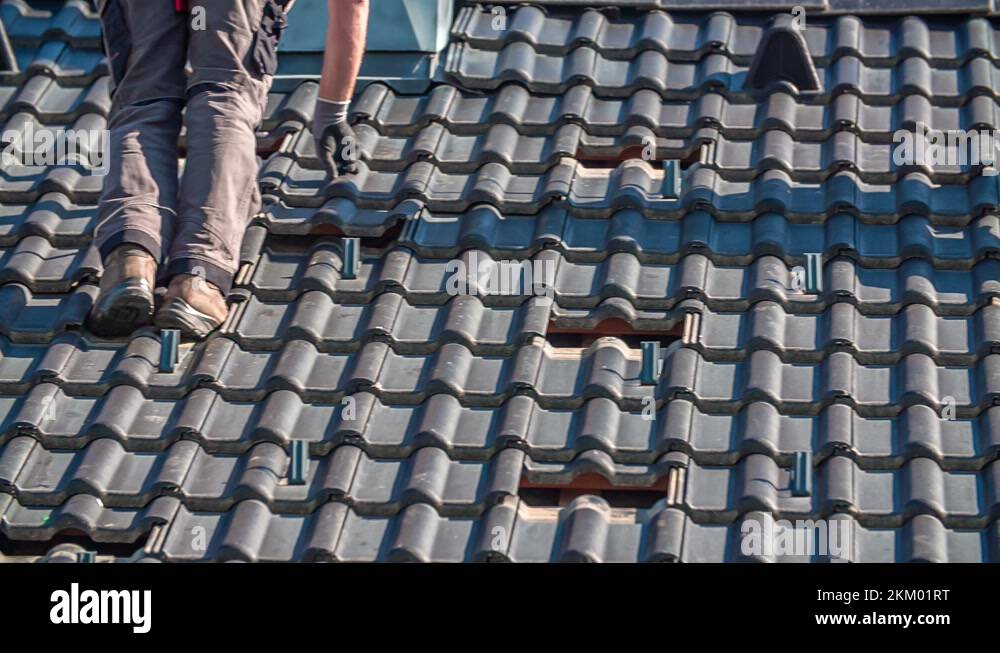 Removing roof tiles Stock Videos & Footage - HD and 4K Video Clips - Alamy