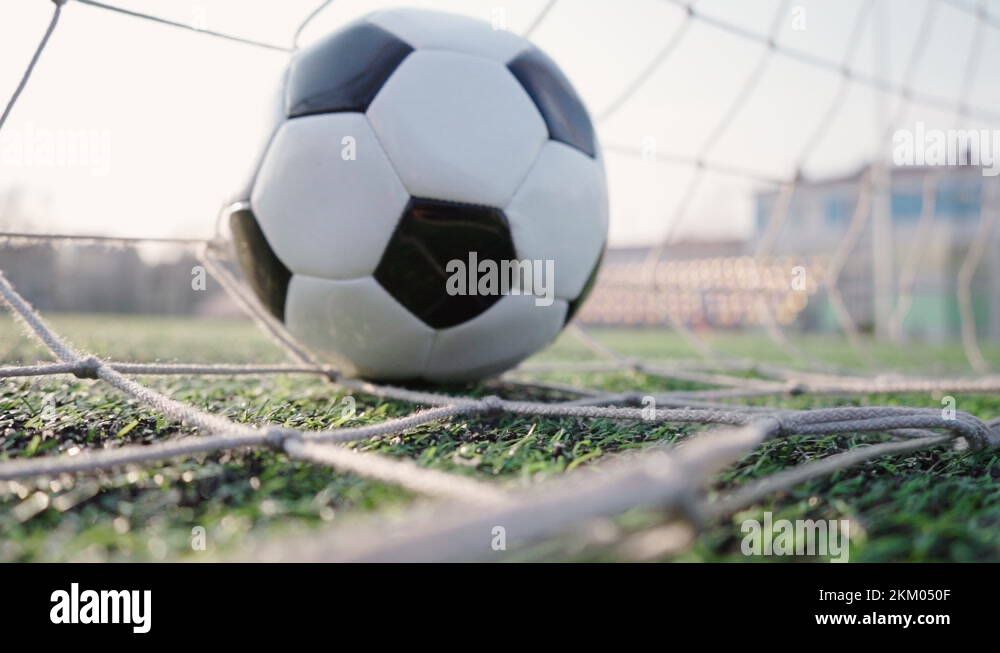 Soccer Ball Flies Into Gates Net In Slow Motion. Football Stadium ...