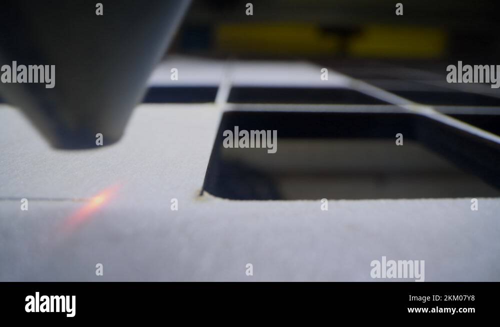 Automatic wooden jigsaw puzzle production on toys factory. 4k macro hdr ...