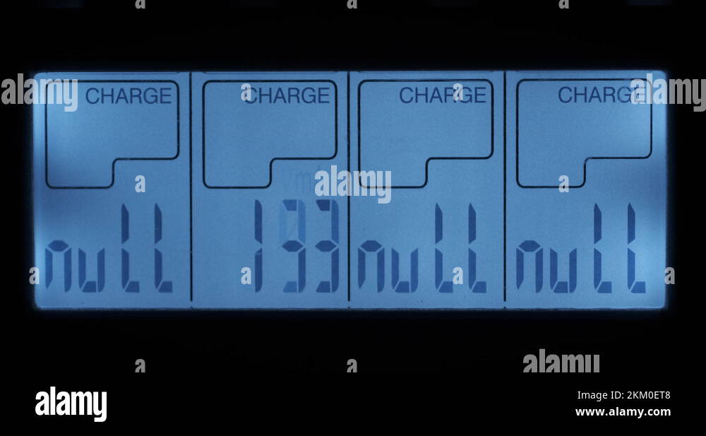 Close-up. Charger display. Accumulator charging. CHARGE symbol on ...