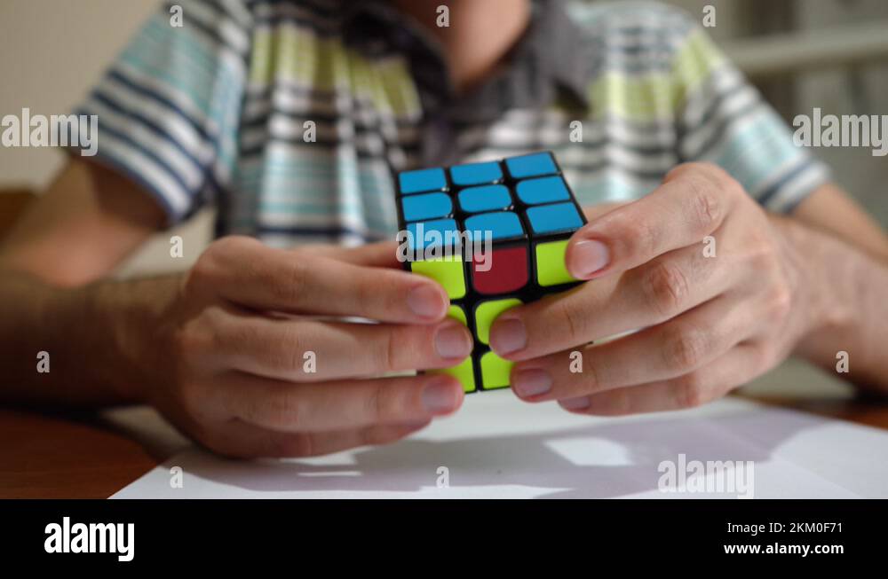 Man with rubic cube Stock Videos & Footage - HD and 4K Video Clips - Alamy